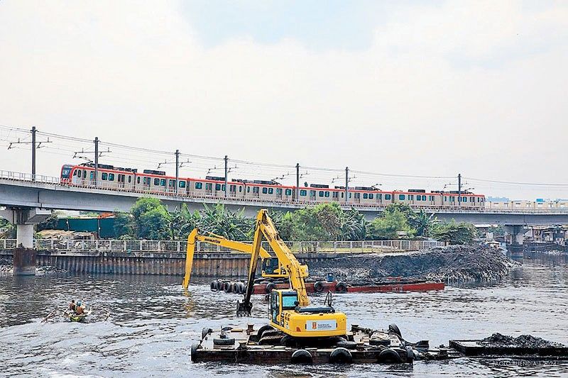SMC, NNIC river cleanups help ease flooding at NAIA, nearby areas ...